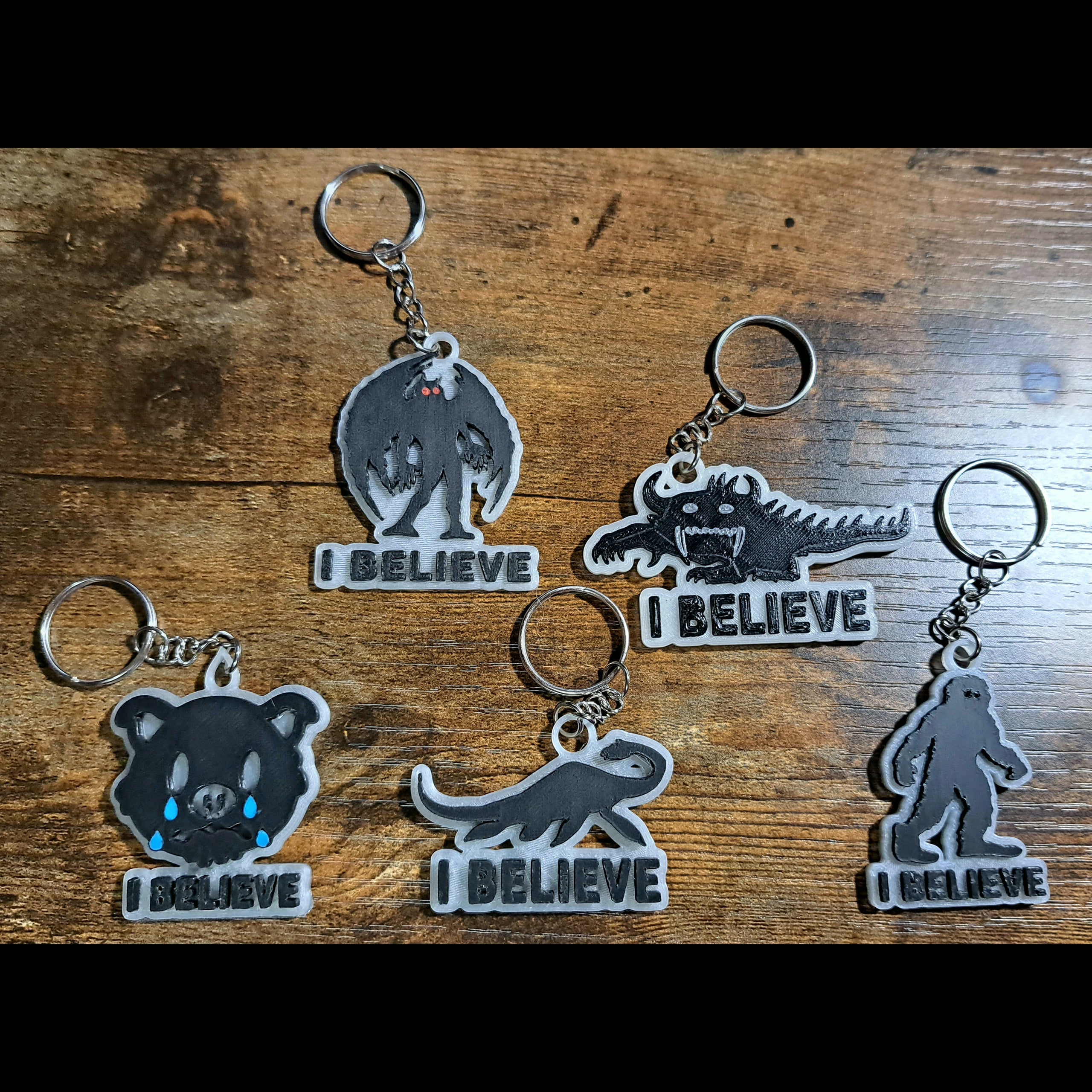 Glow in the Dark Cryptid Keychains | The Geek Foundry